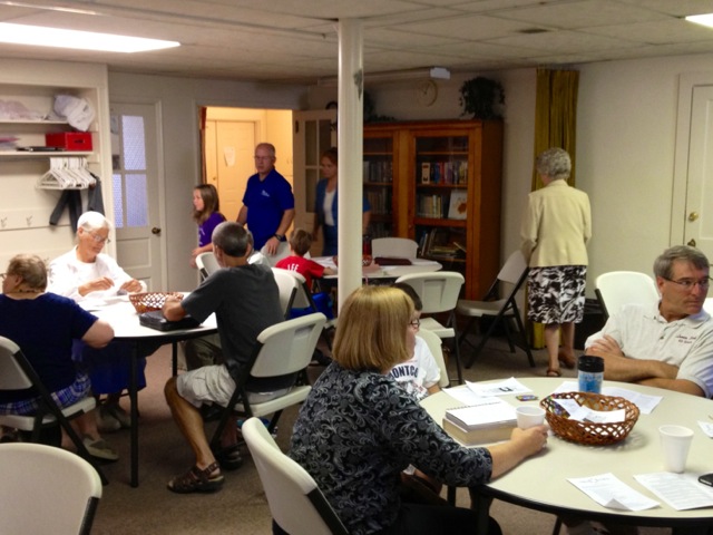 Worshiping around the table - Mosaic Mennonites